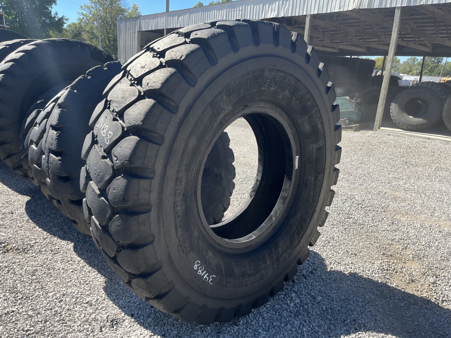 21.00R35 Bridgestone OTR Tire E-4 VMTP 2-Star CONDITION: UsedTREAD DEPTH: 41/32ndsDETAILS: Clean ...